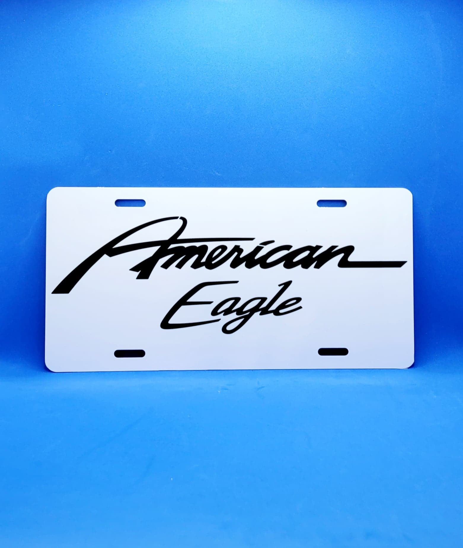 American Coach Logo License Plate | The Roving M's